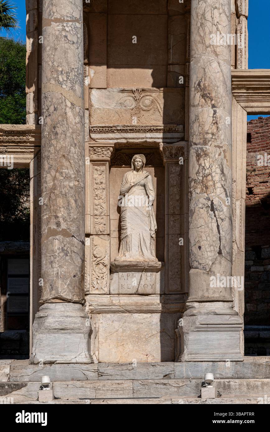 Niche statue framed by Corinthian columns on the Celsus Library façade ...