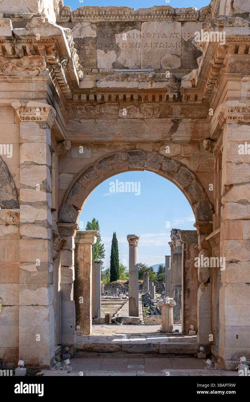 Archway of the Gate of Hadrian in Ephesus, framing a view down Curetes ...