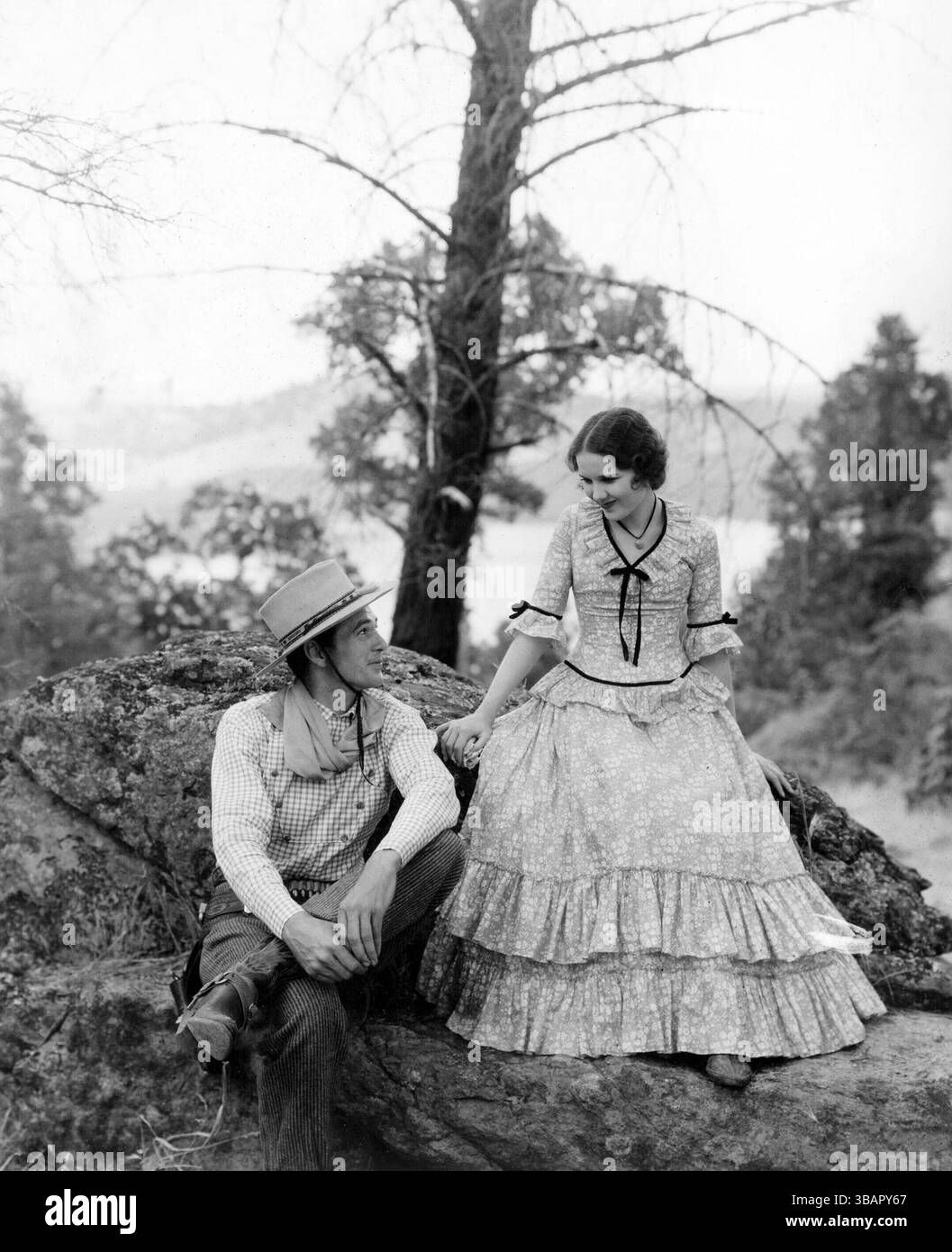 Gary Cooper and Mary Brian in a western movie, The Virginian (Paramount ...
