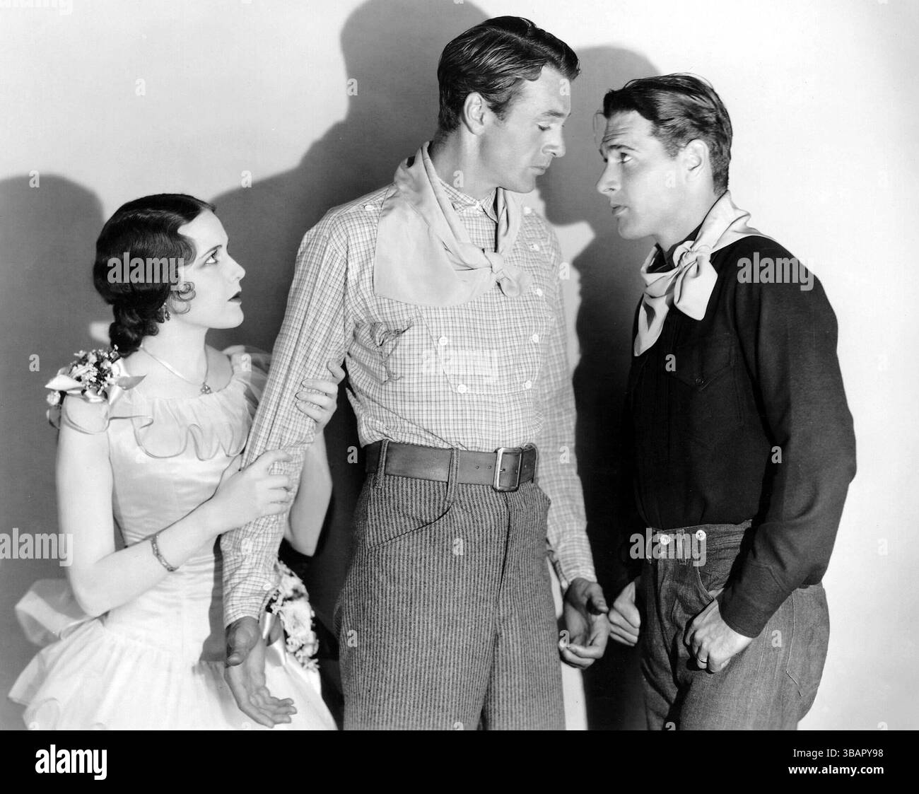 Mary Brian, Richard Arlen and Gary Cooper in The Virginian (Paramount, 1929) Western movie Stock ...