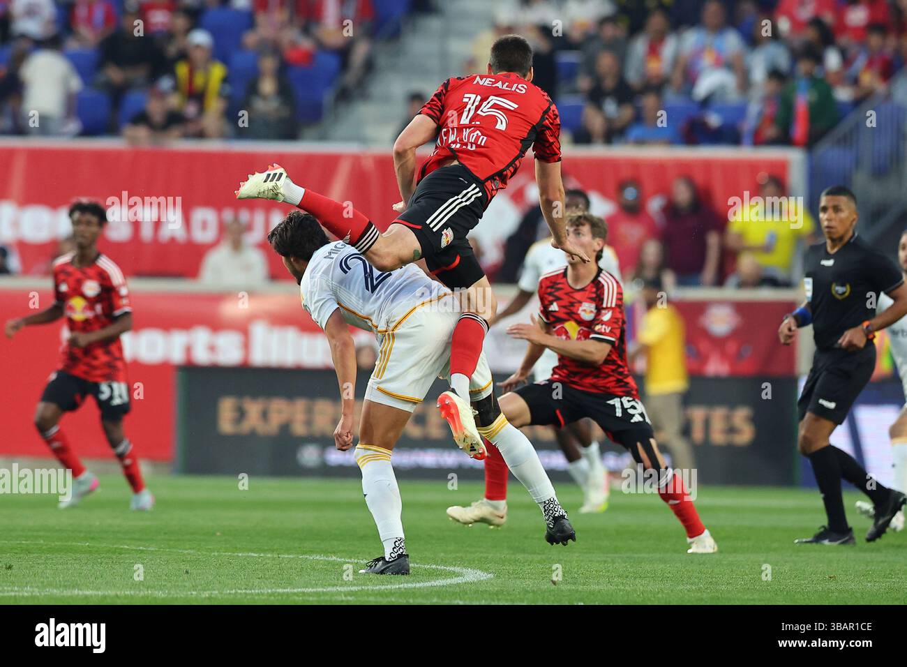HARRISON, NJ - MAY 10: Sean Nealis #15 of New York Red Bulls battles ...