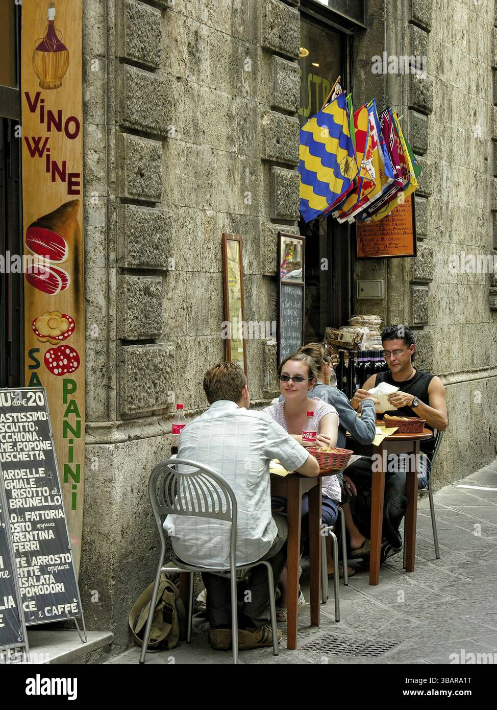 Il Palio di Siena, historical horse race, alley with small trattoria ...