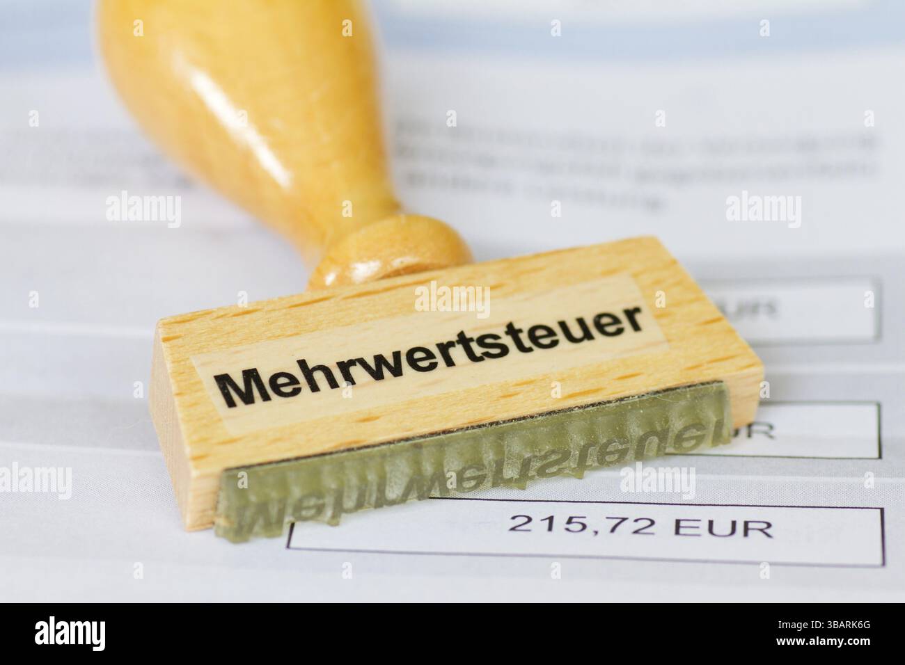 A stamp labelled VAT is on a bank statement, studio photograph, Hesse ...