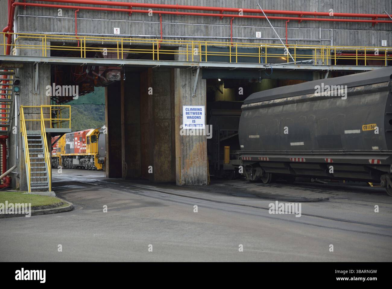 Coal from the Stockton open cast coal mine fills a rail car at near ...