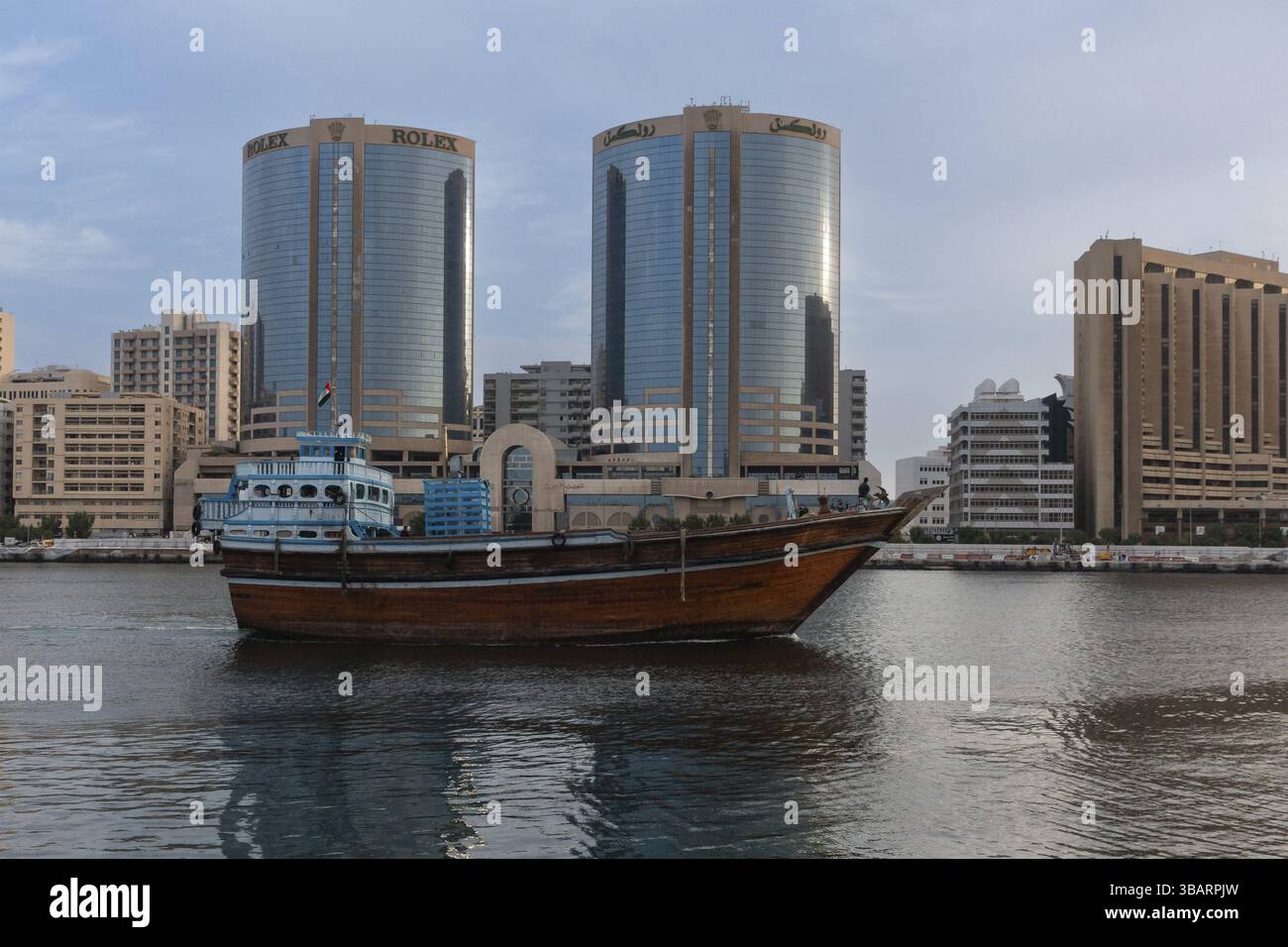 View from the Al Seef Area across the Dubai Creek towards a cargo dhow ...