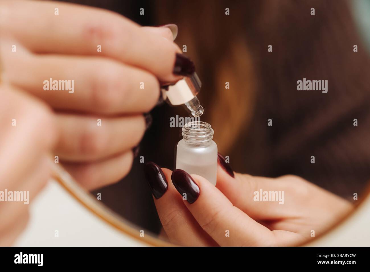 Reflection woman using serum hi-res stock photography and images - Alamy