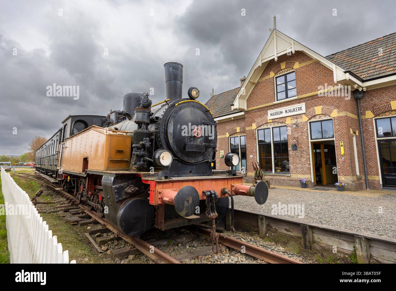 Vintage steam train parked at the Marrum Westernijkerk station in ...