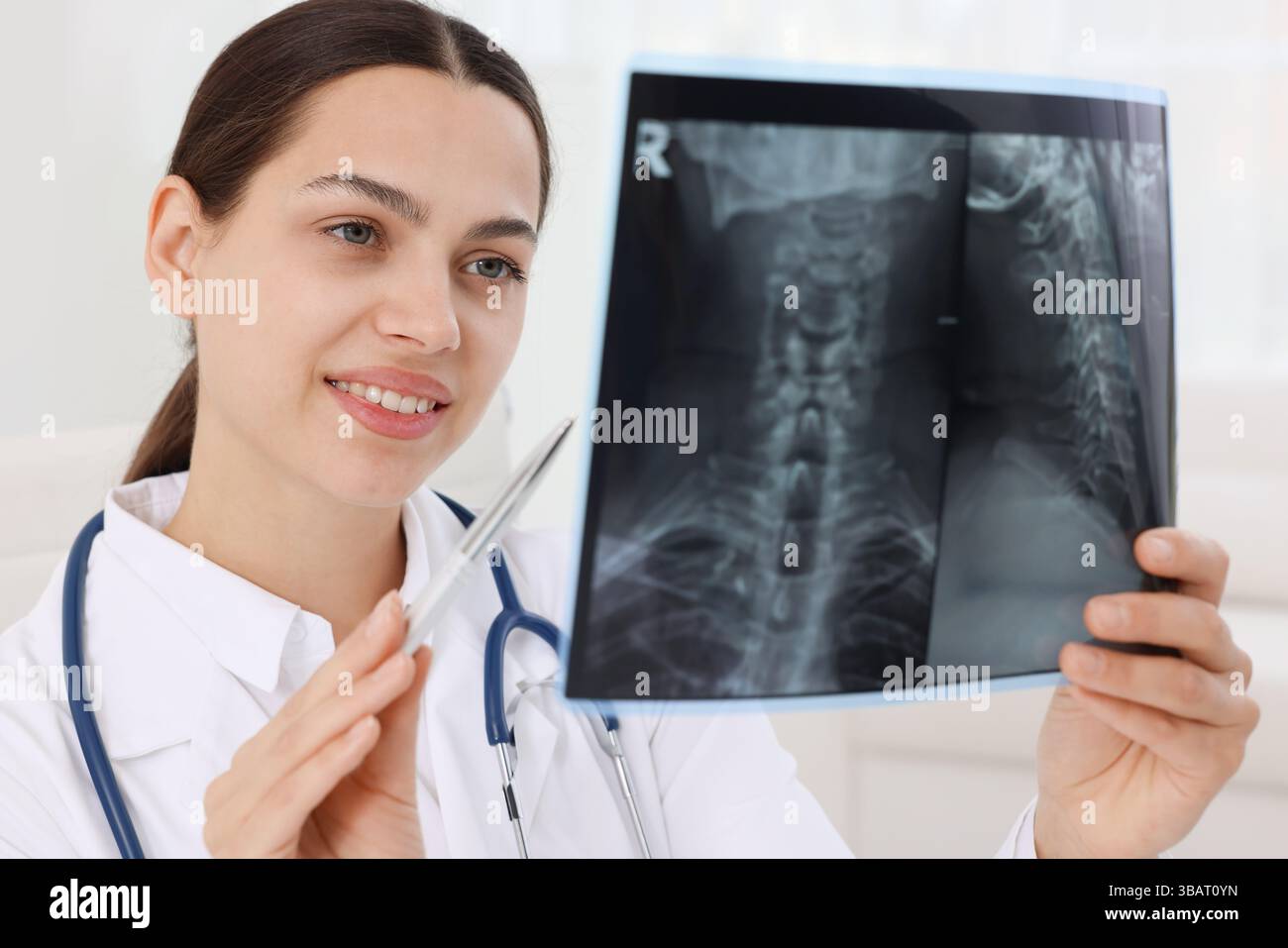 Doctor examining neck MRI scan in hospital Stock Photo - Alamy