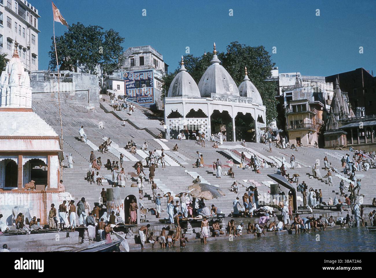 1960s, historical, people at a ghat - riverside steps - on the ...