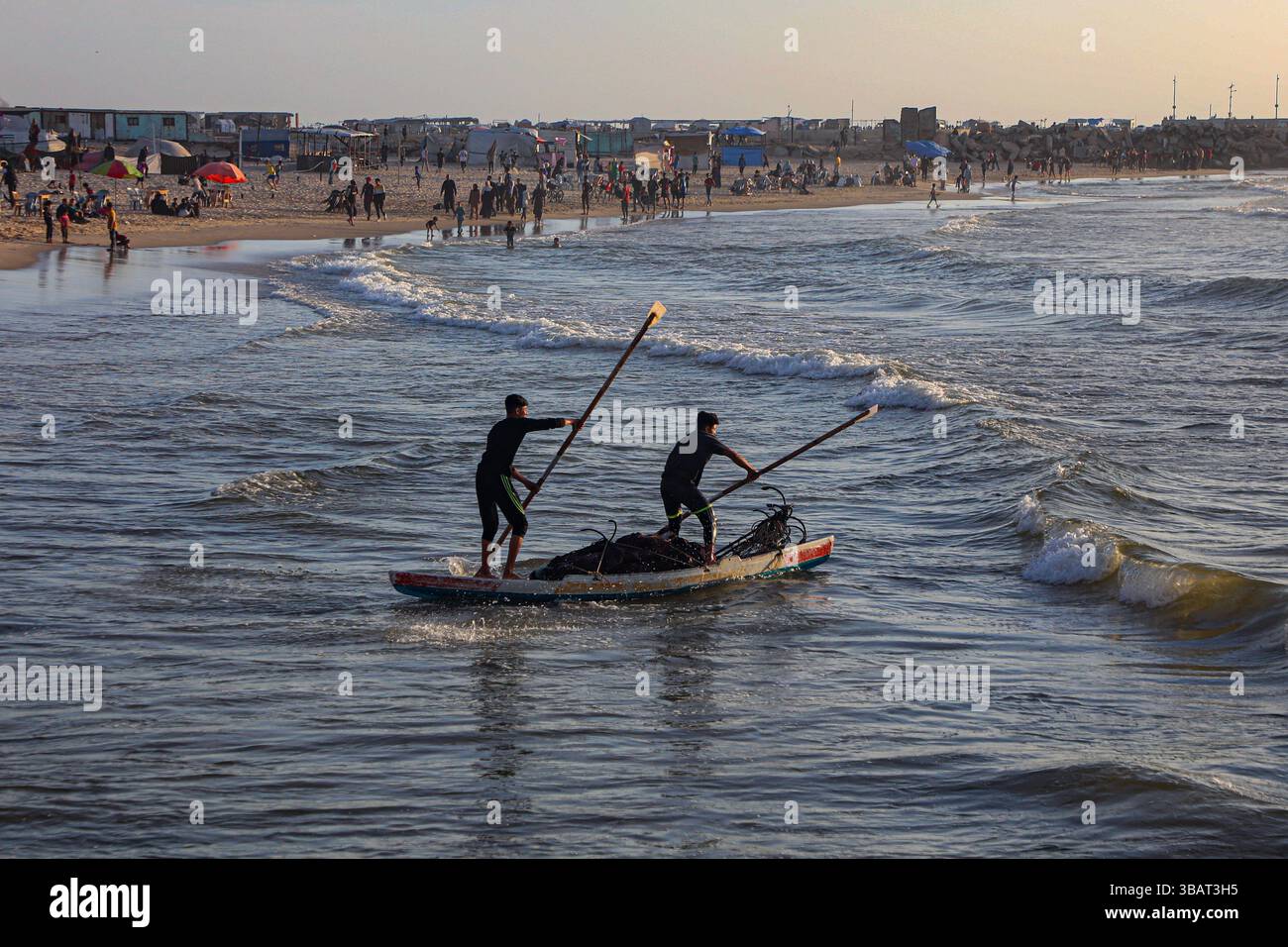 Gaza. 12th May, 2025. Palestinians enjoy their time on the beach during ...
