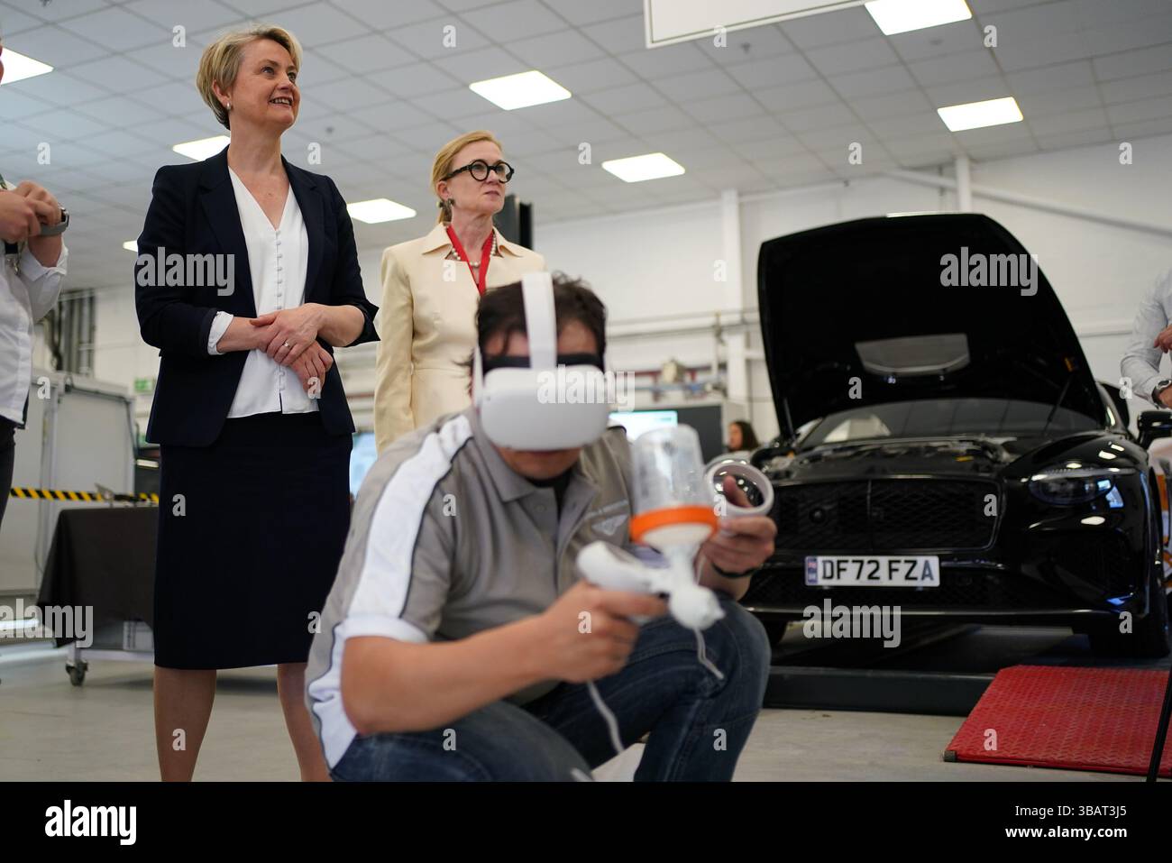 Home Secretary Yvette Cooper (left) visits the Bentley factory in Crewe ...