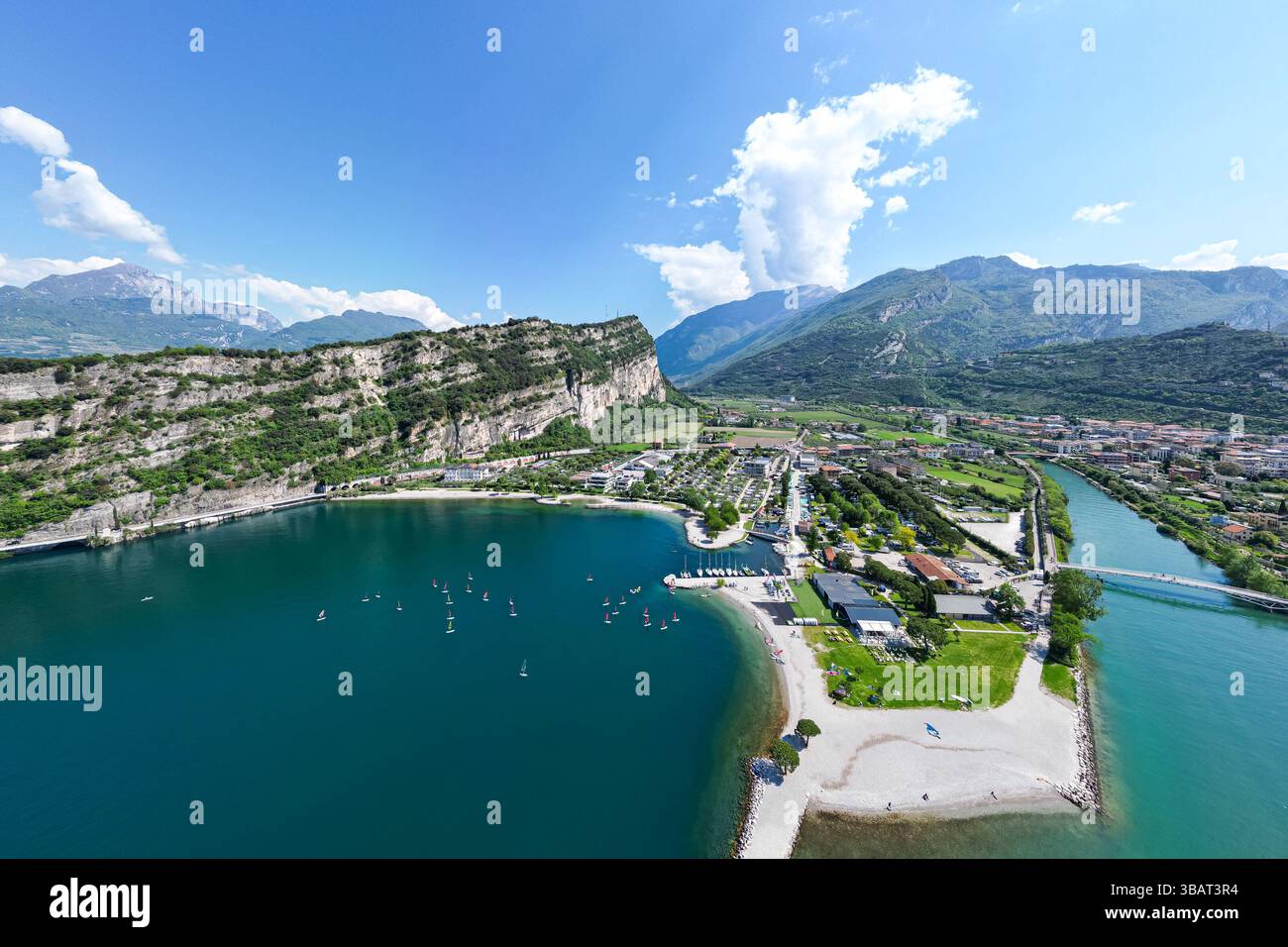 Aerial view of Riva del Garda and Torbole with river Sarco. View of ...