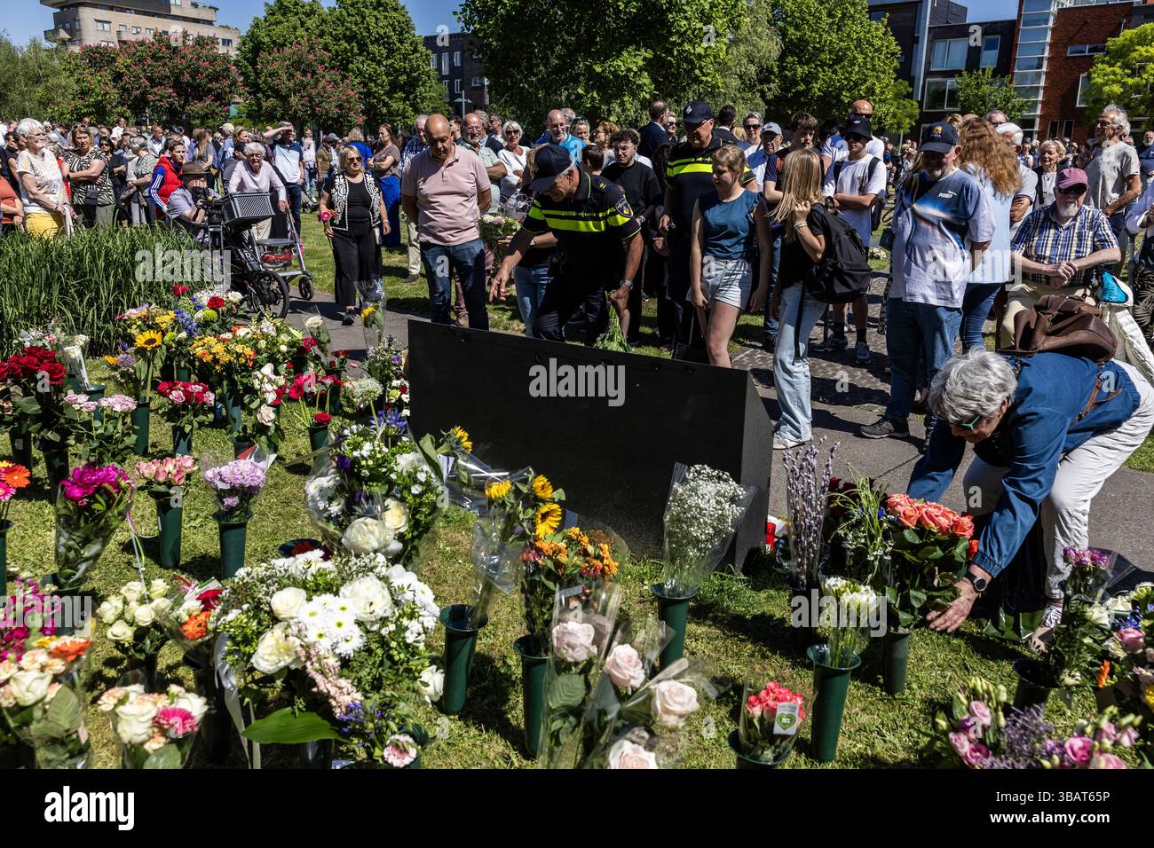 ENSCHEDE - Interested parties lay flowers at the memorial for the ...