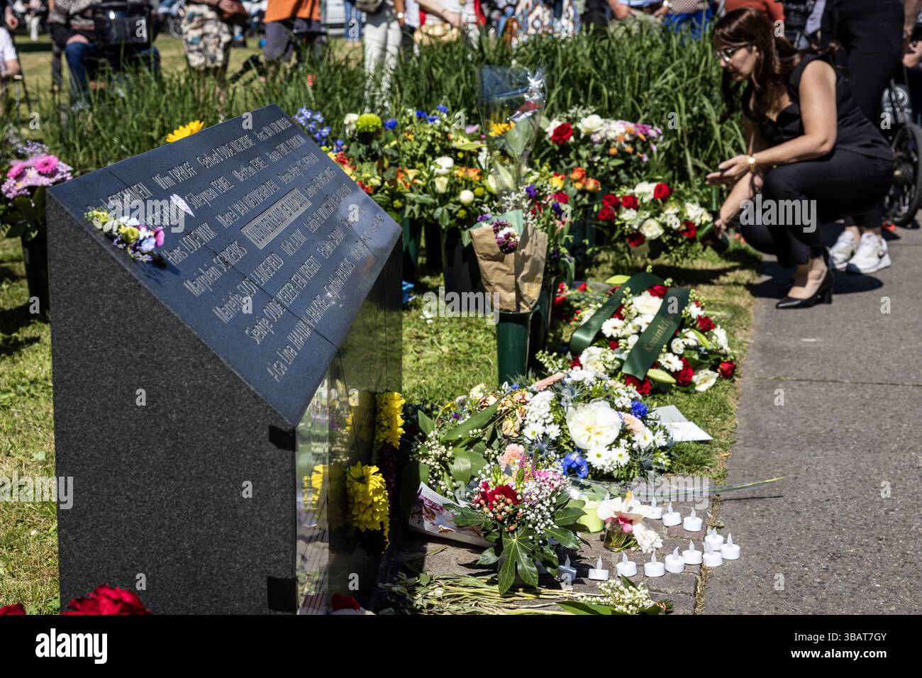 ENSCHEDE - Interested parties lay flowers at the memorial for the ...