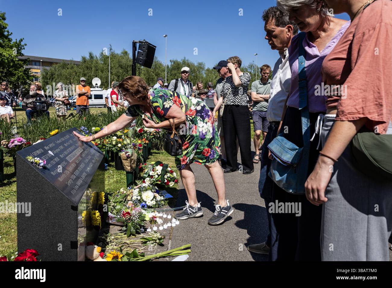 ENSCHEDE - Interested parties lay flowers at the memorial for the ...