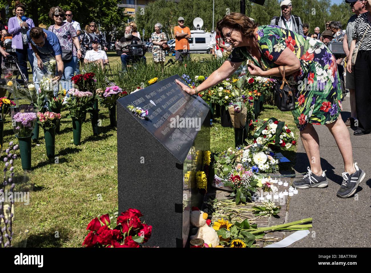 ENSCHEDE - Interested parties lay flowers at the memorial for the ...