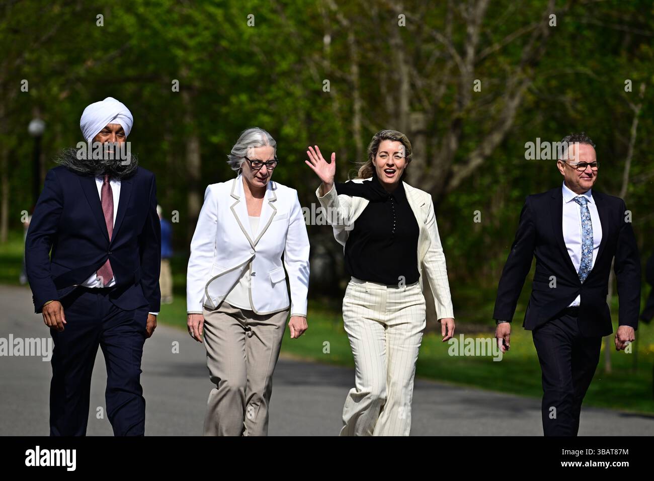 Ottawa, Canada. 13th May, 2025. Randeep Sarai, left to right, Patty ...