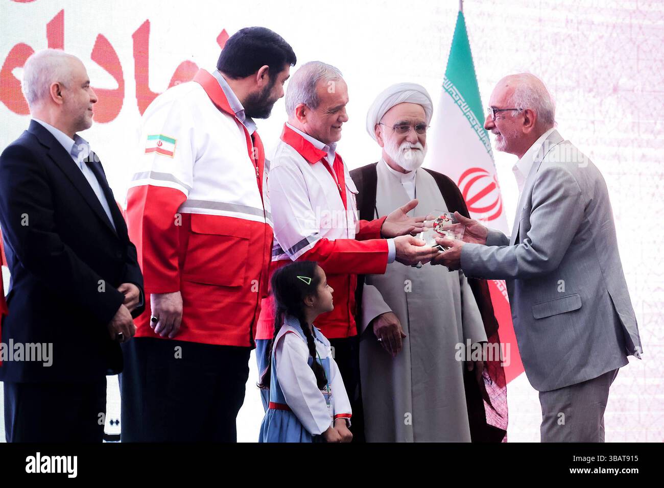 Iranian President Masoud Pezeshkian attends a conference marking the ...