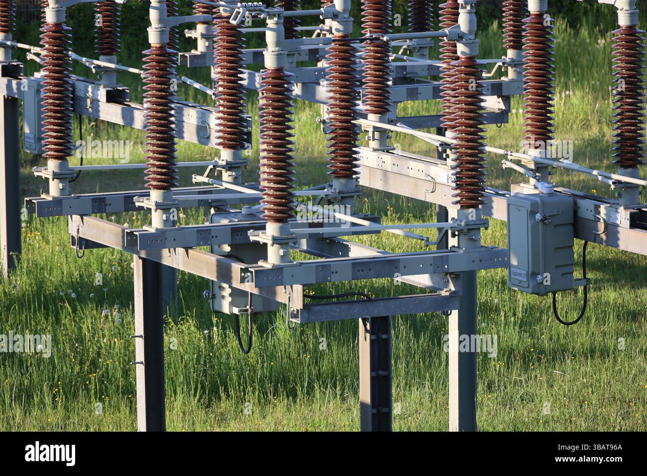 A tall power line pole with a lot of wires on it Stock Photo - Alamy