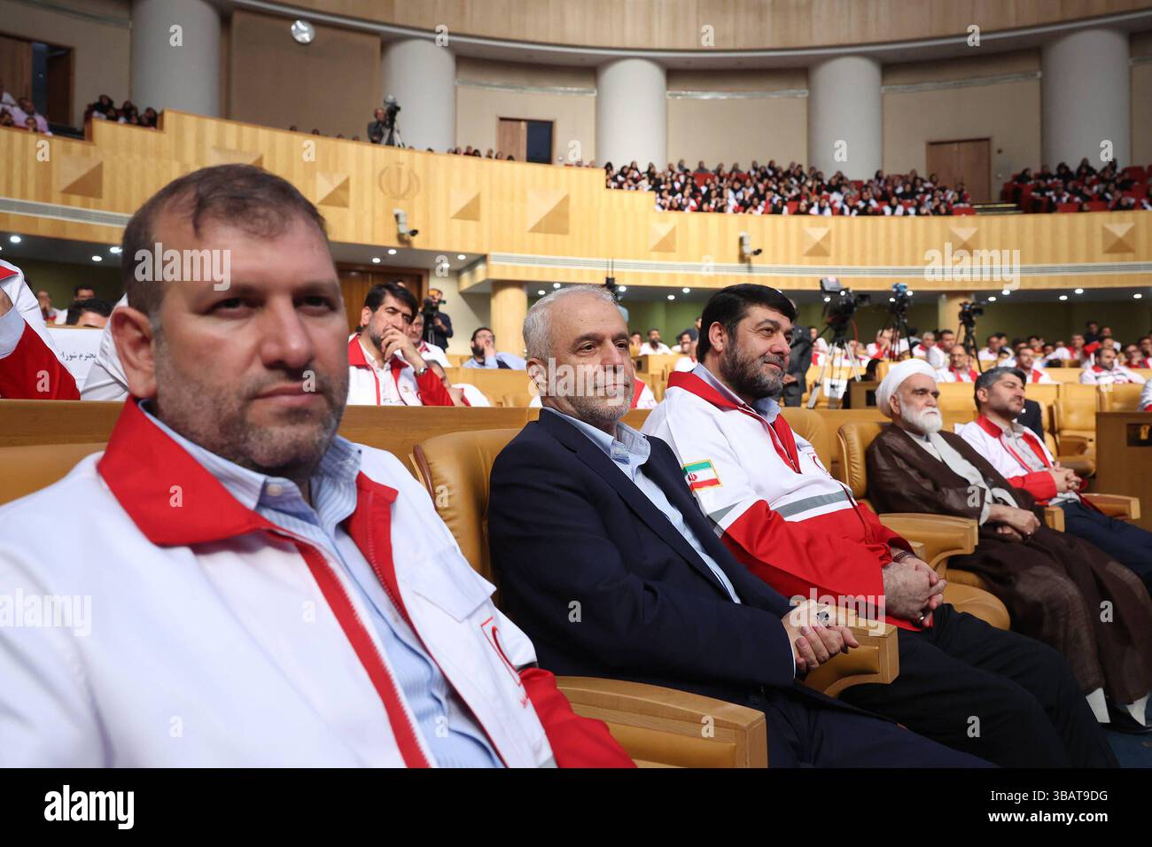 Iranian President Masoud Pezeshkian attends a conference marking the ...