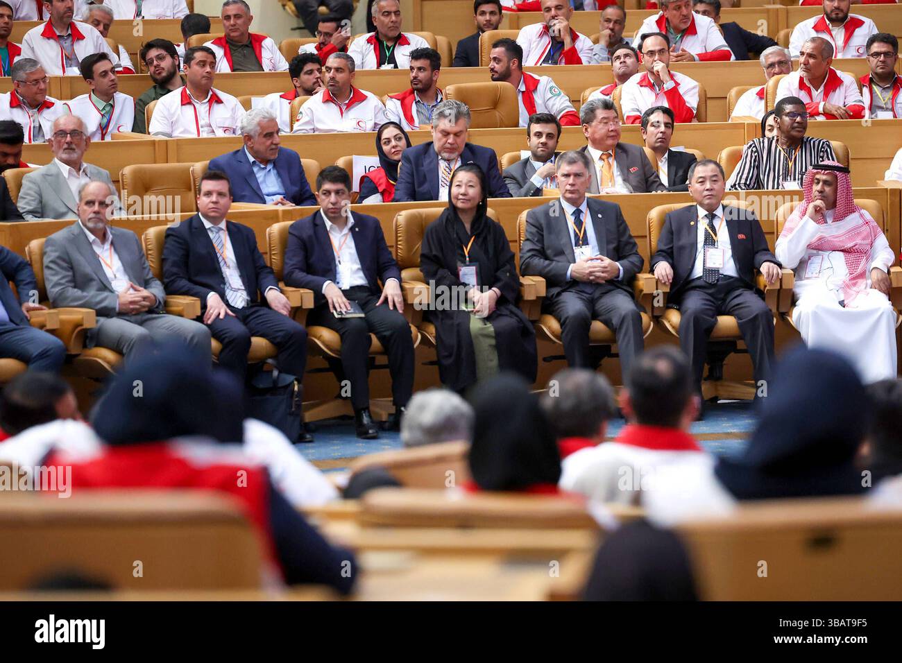 Iranian President Masoud Pezeshkian attends a conference marking the ...
