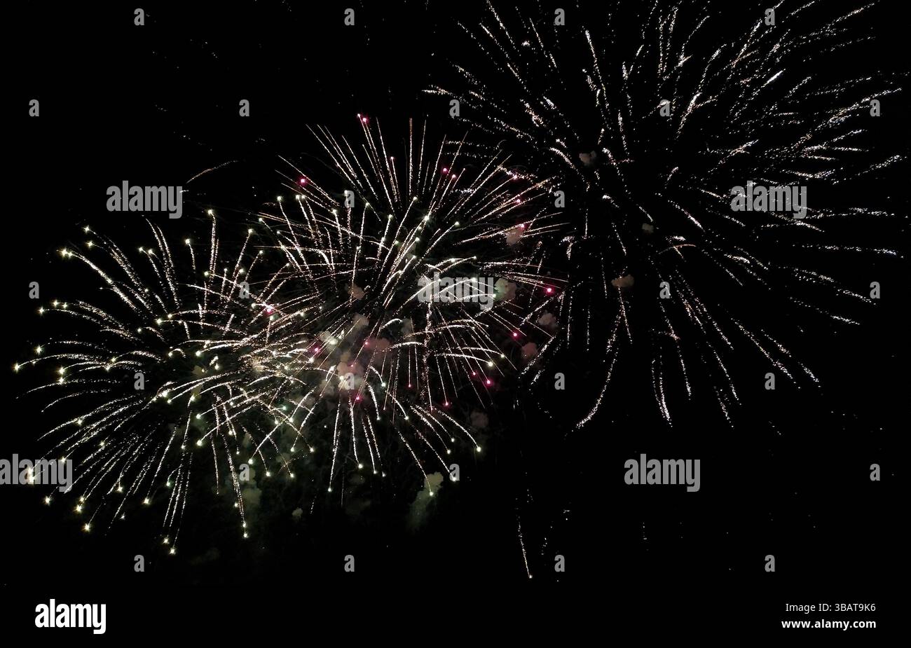 Spectacular fireworks display exploding in the night sky. Vibrant ...