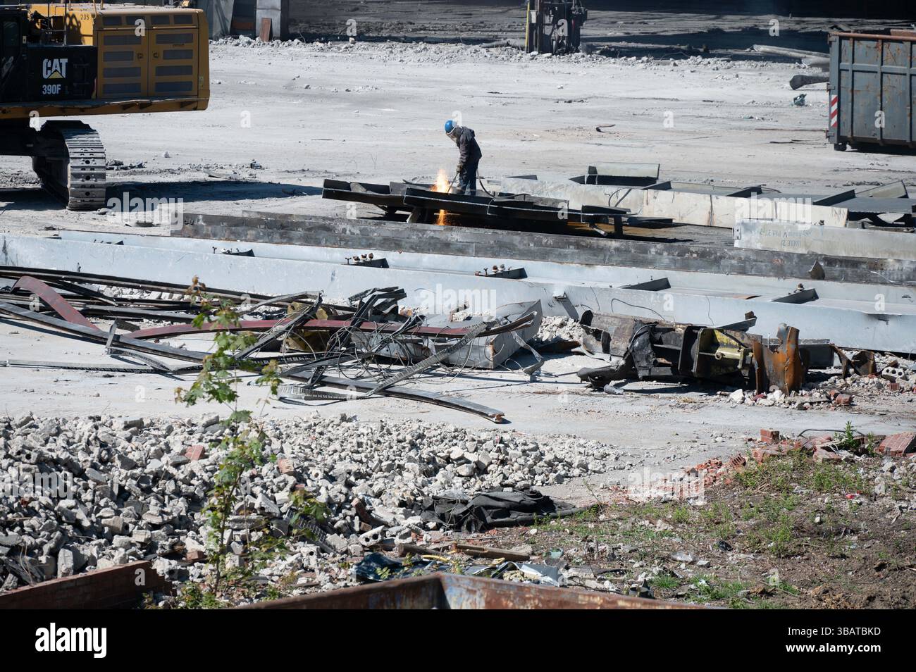 Demolition excavators at work, demolition work on the former continuous ...