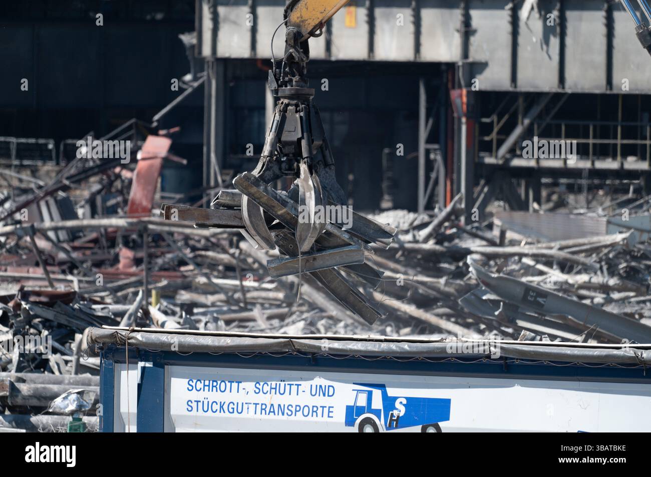 Demolition excavators at work, demolition work on the former continuous ...