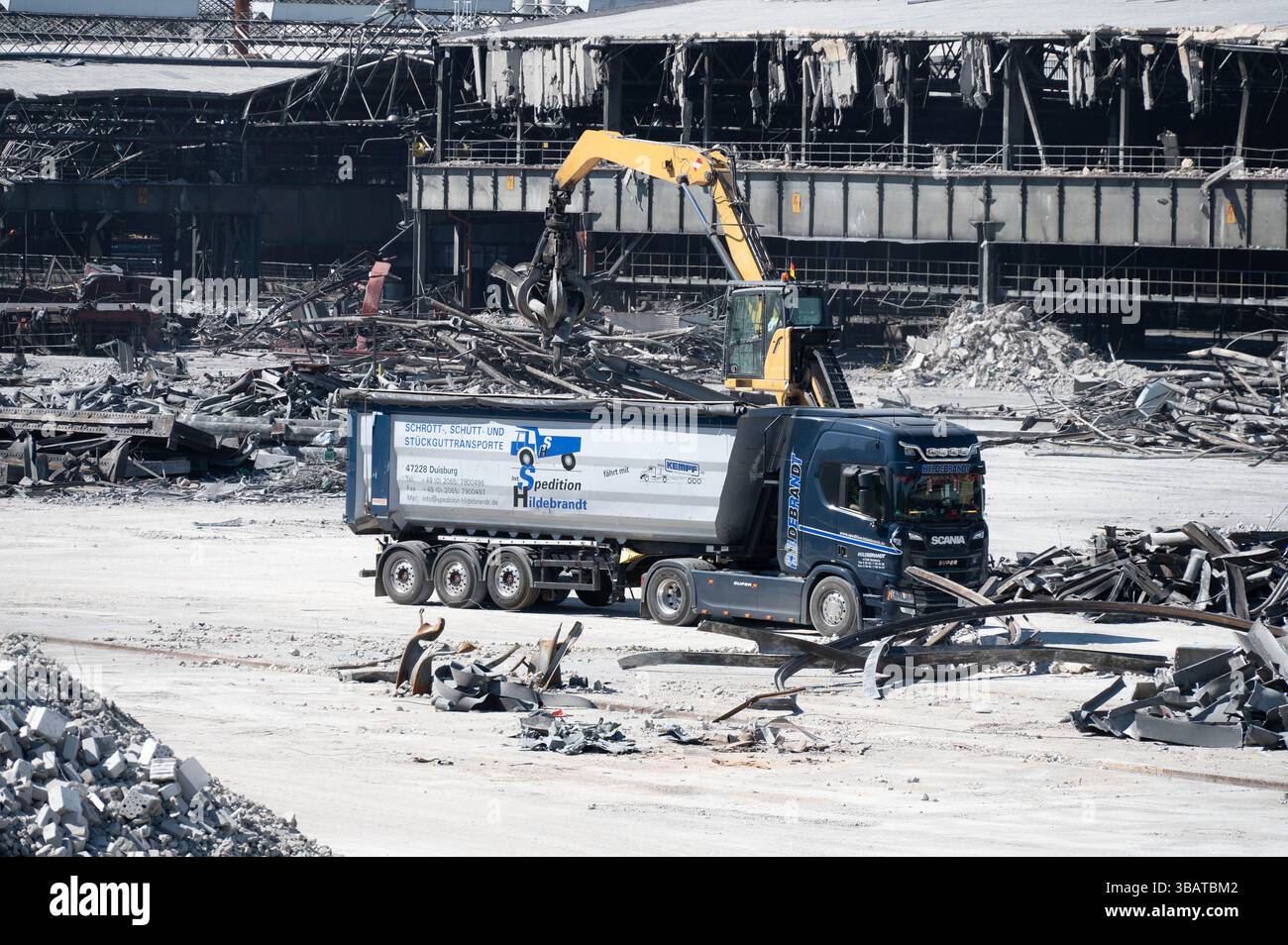 Demolition excavators at work, demolition work on the former continuous ...