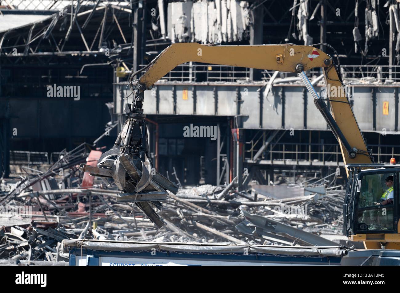 Demolition excavators at work, demolition work on the former continuous ...