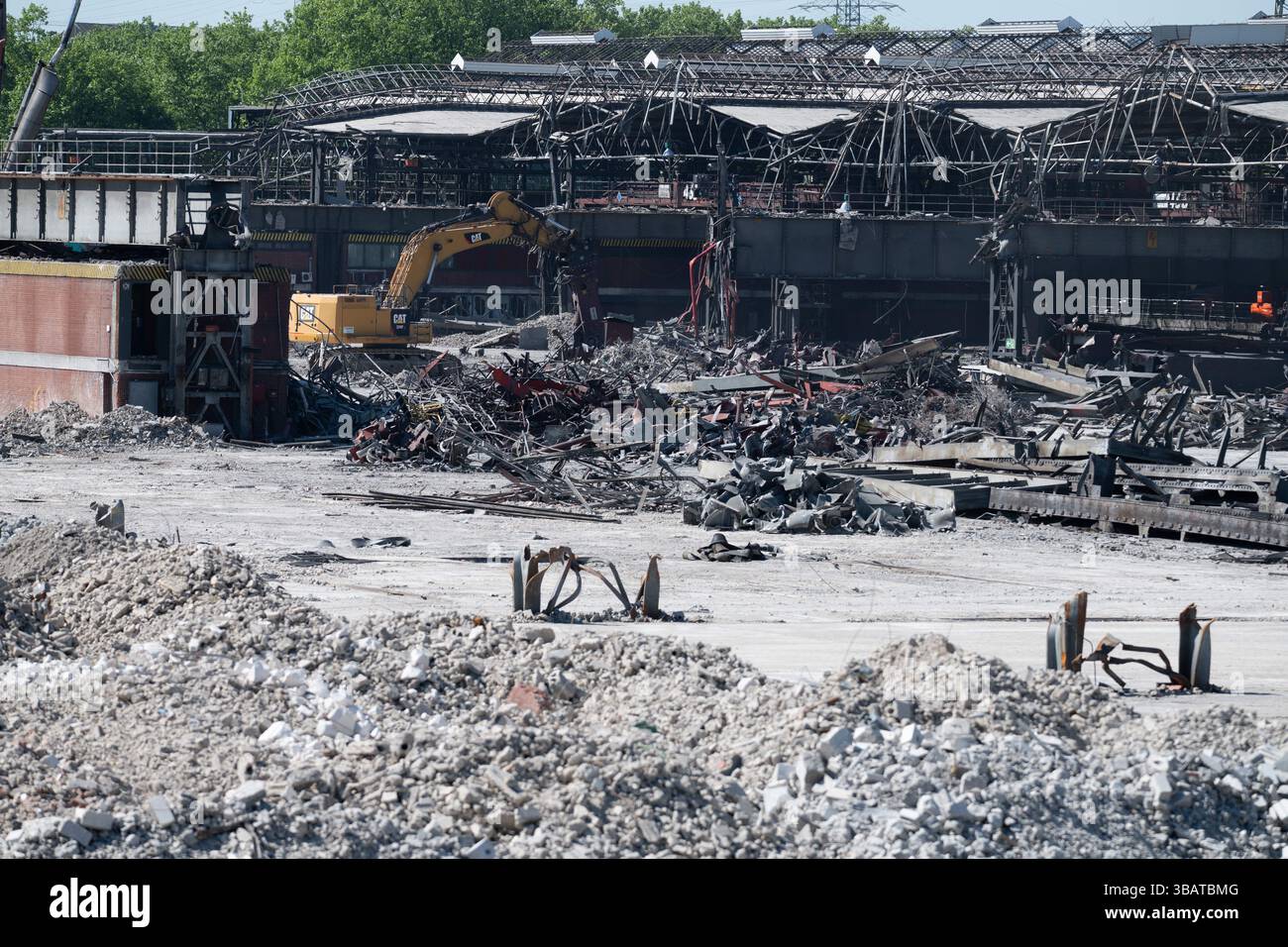 Demolition excavators at work, demolition work on the former continuous ...
