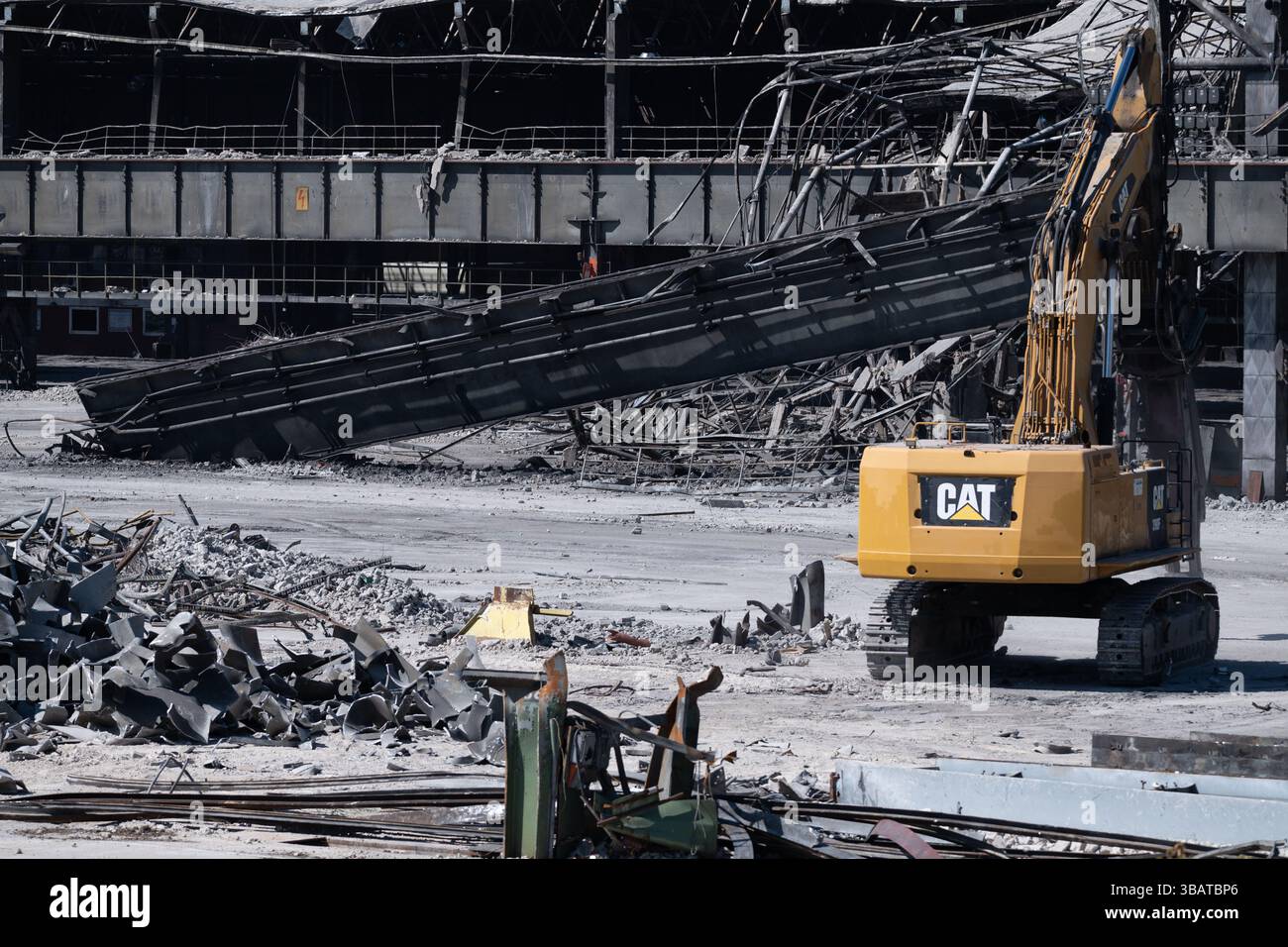 Demolition excavators at work, demolition work on the former continuous ...