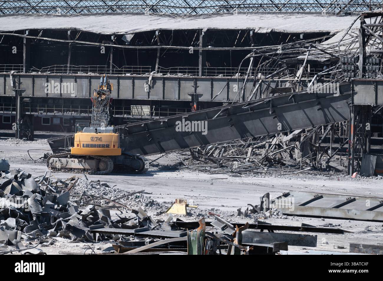 Demolition excavators at work, demolition work on the former continuous ...