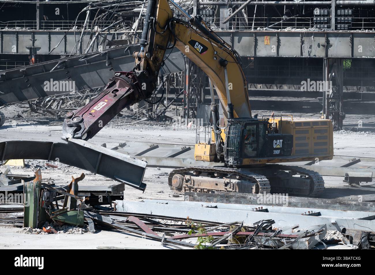 Demolition excavators at work, demolition work on the former continuous ...