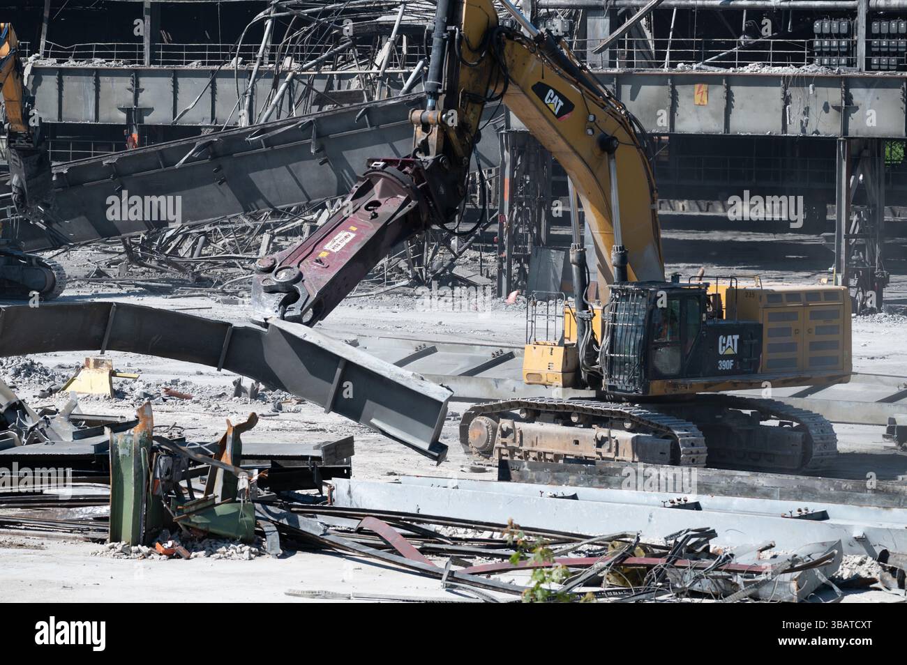 Demolition excavators at work, demolition work on the former continuous ...