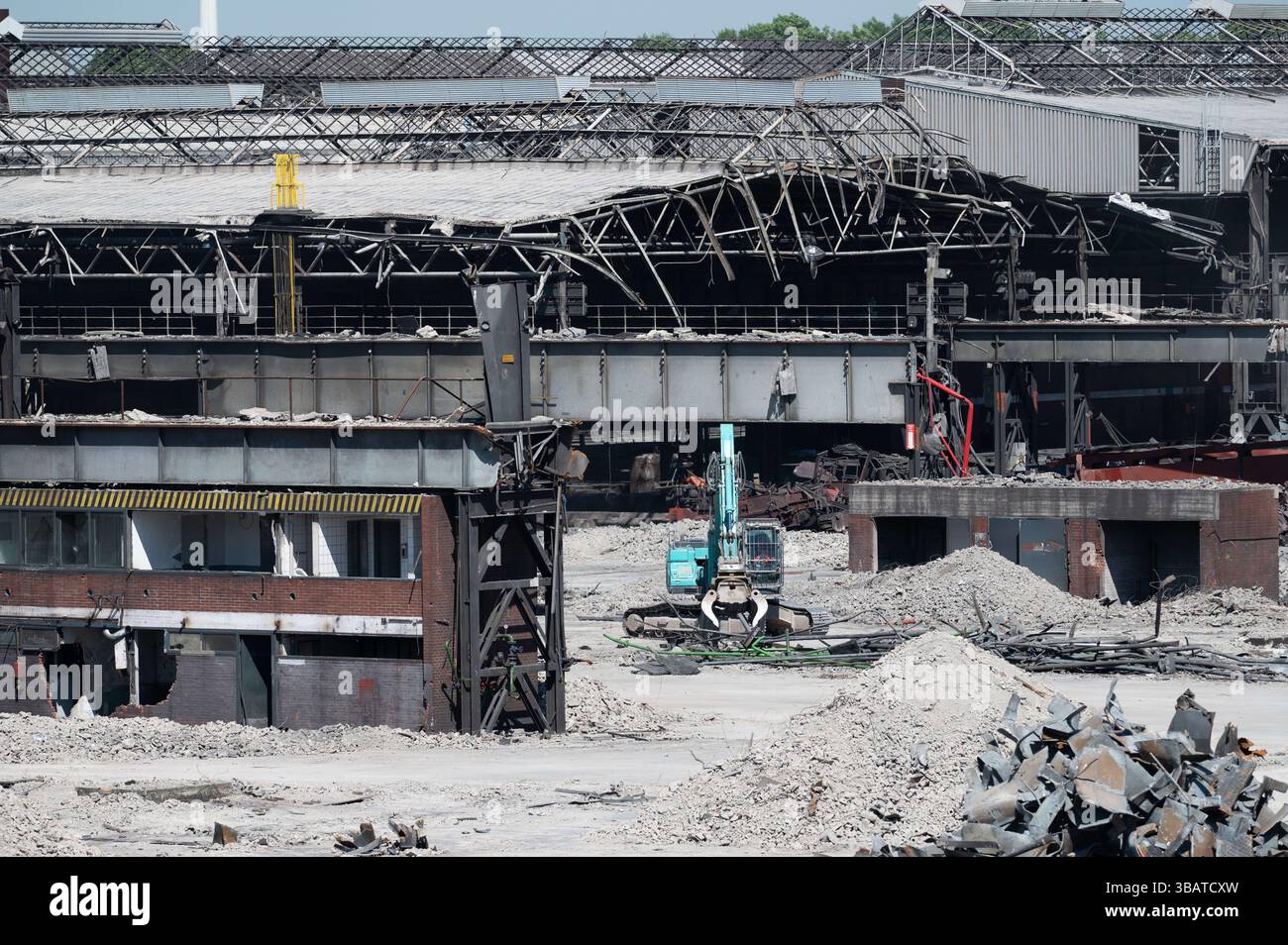Demolition excavators at work, demolition work on the former continuous ...