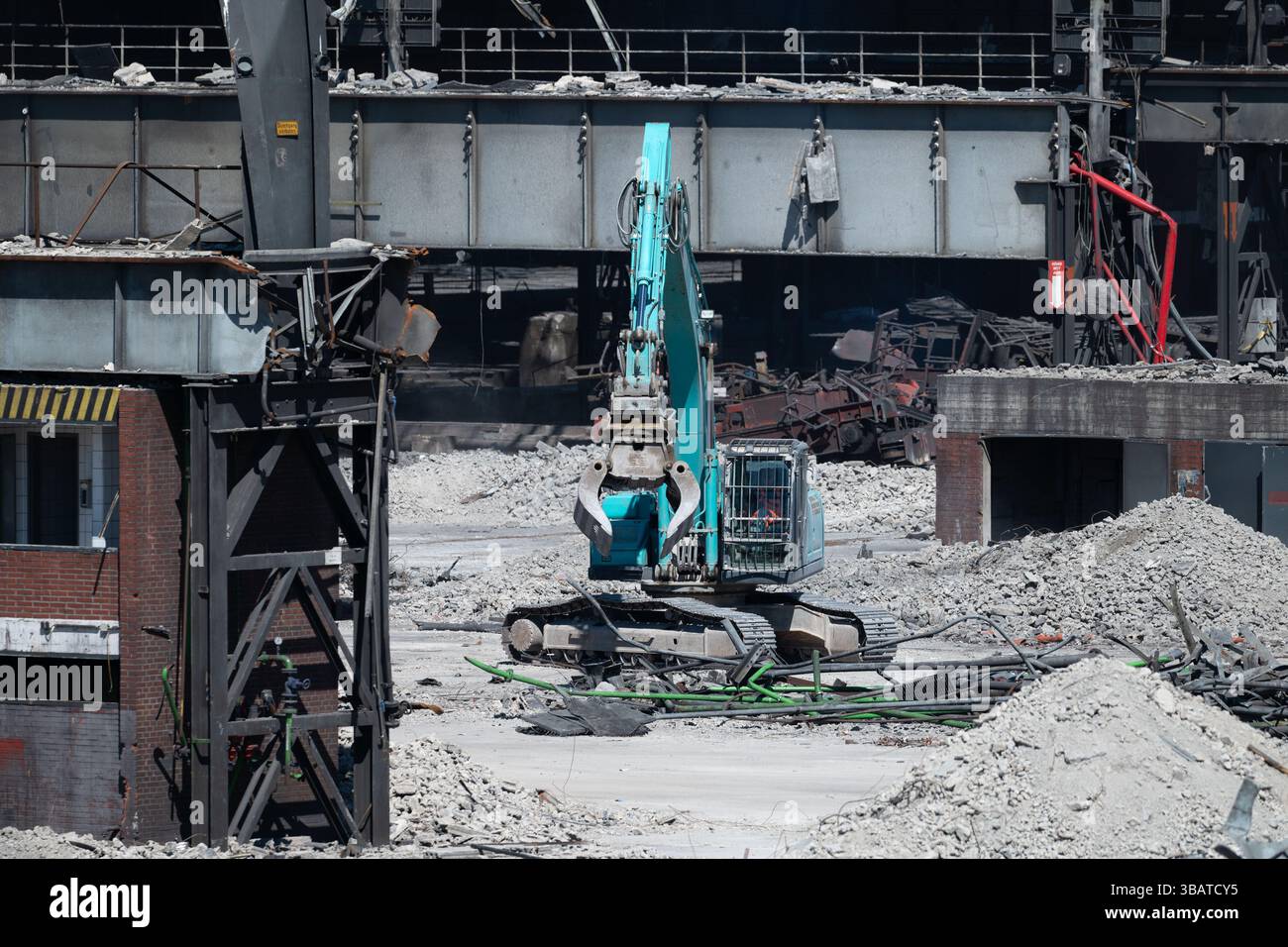 Demolition excavators at work, demolition work on the former continuous ...
