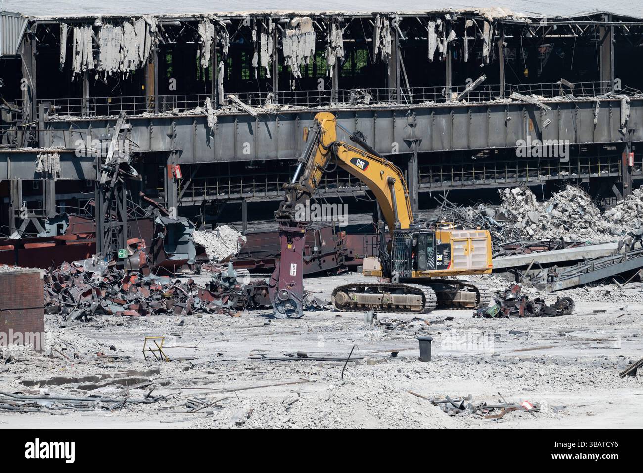 Demolition excavators at work, demolition work on the former continuous ...