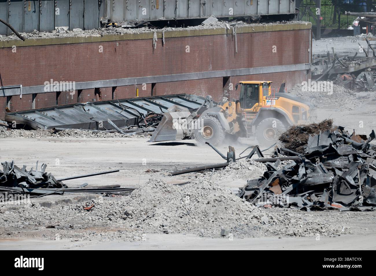 Demolition excavators at work, demolition work on the former continuous ...