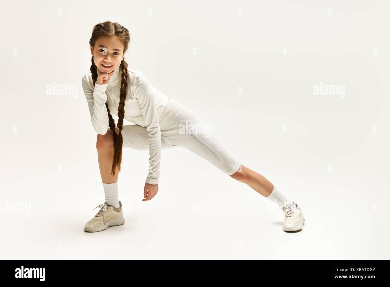 Sporty girl poses confidence hi-res stock photography and images - Alamy