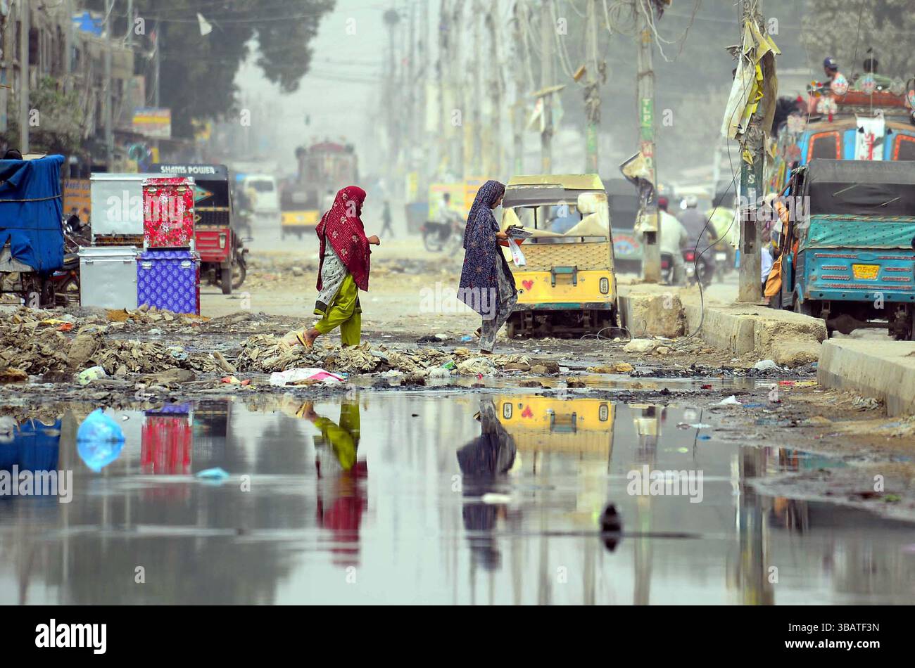 Inundated road by overflowing sewerage water, creating problems for ...