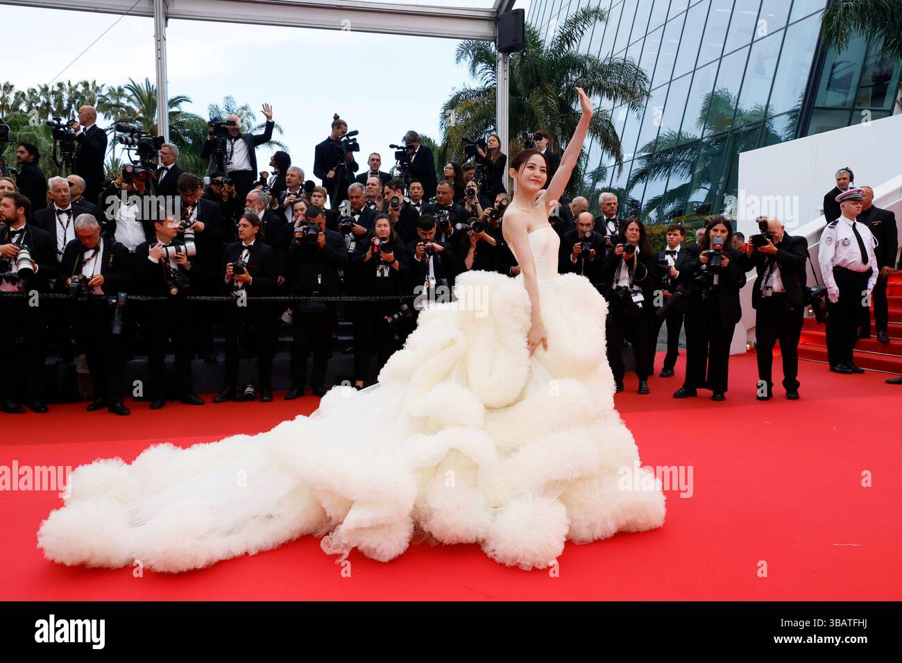 Wan QianHui poses for photographers during the opening ceremony red ...