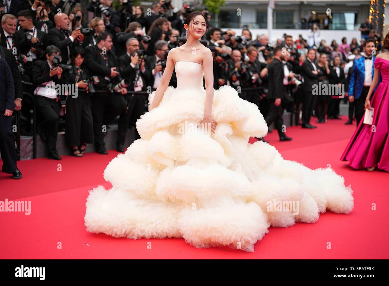 Wan QianHui poses for photographers during the opening ceremony red ...
