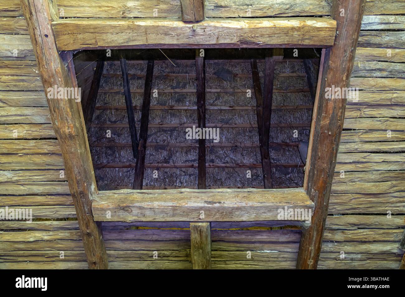 Hole in the ceiling of an old barn Stock Photo - Alamy