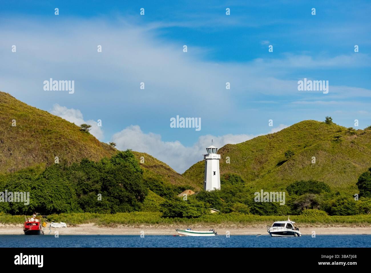 White lighthouse on the Padar island in Komodo national park Indonesia ...