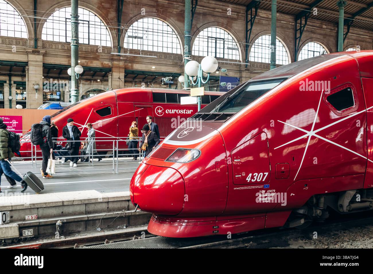 Paris, France - 23 February 2025: Modern red Eurostar high-speed train ...