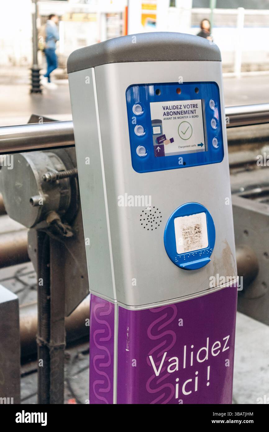 Paris, France - 23 February 2025: Ticket validation machine at Gare du ...