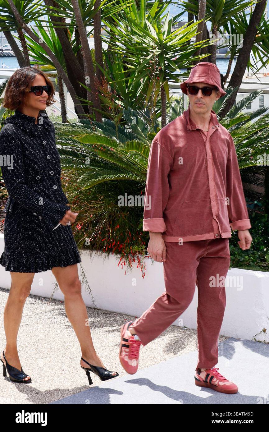 Halle Berry, left, and jury member Jeremy Strong pose for photographers ...
