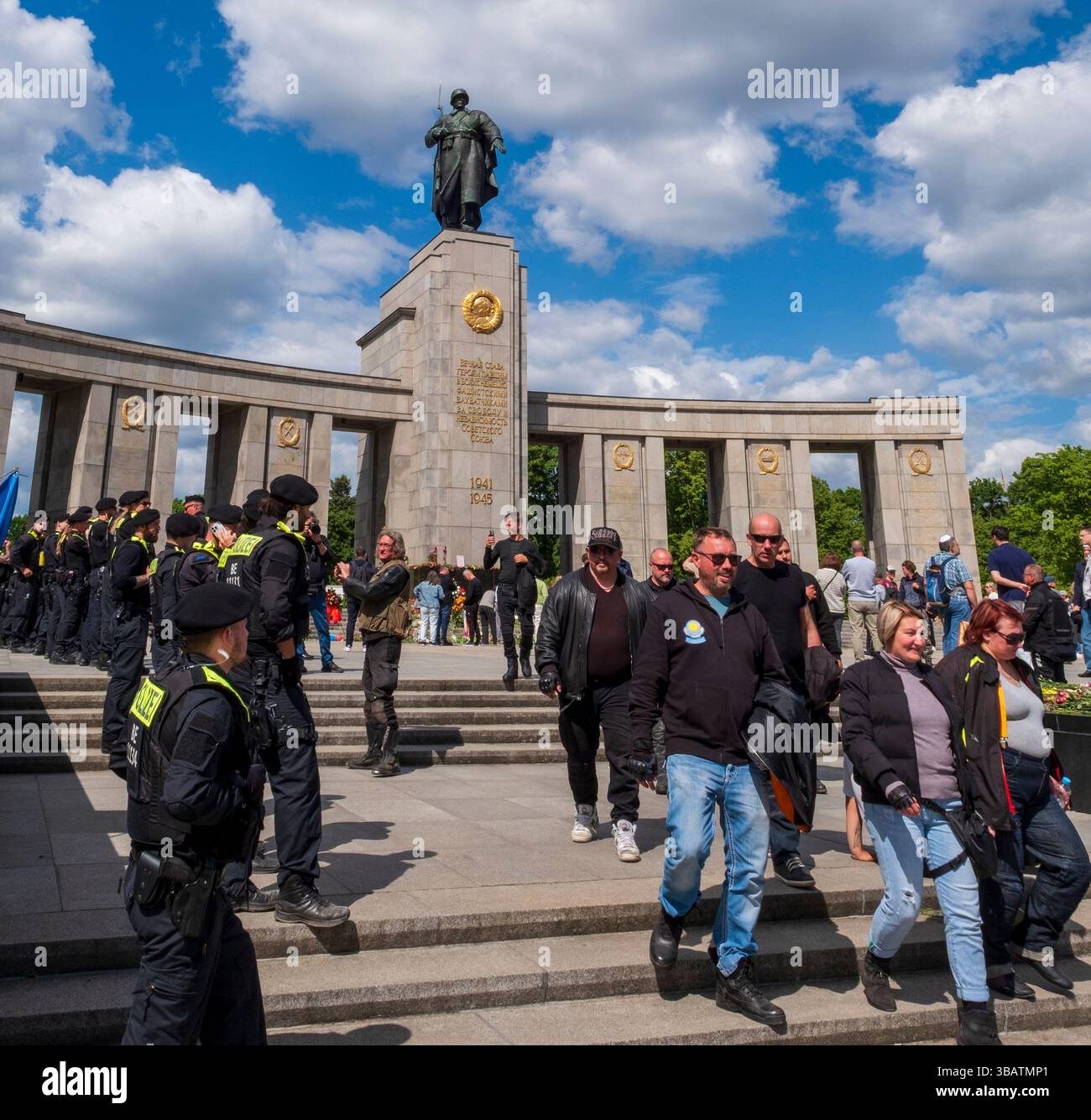 People gather at Soviet War memorial in the Tiergarten district of ...