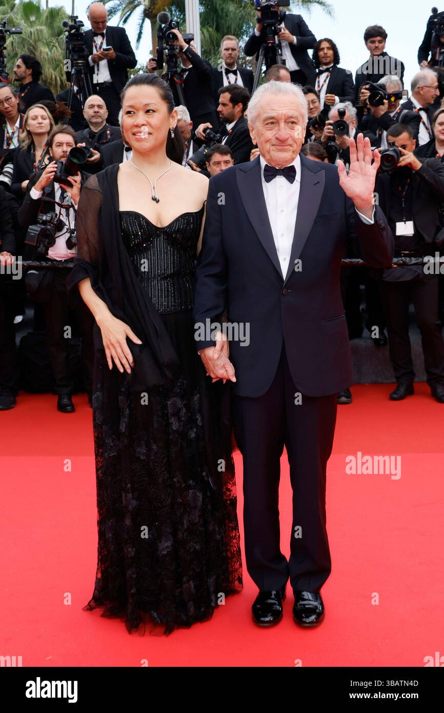 Tiffany Chen, left, and Robert De Niro pose for photographers during ...